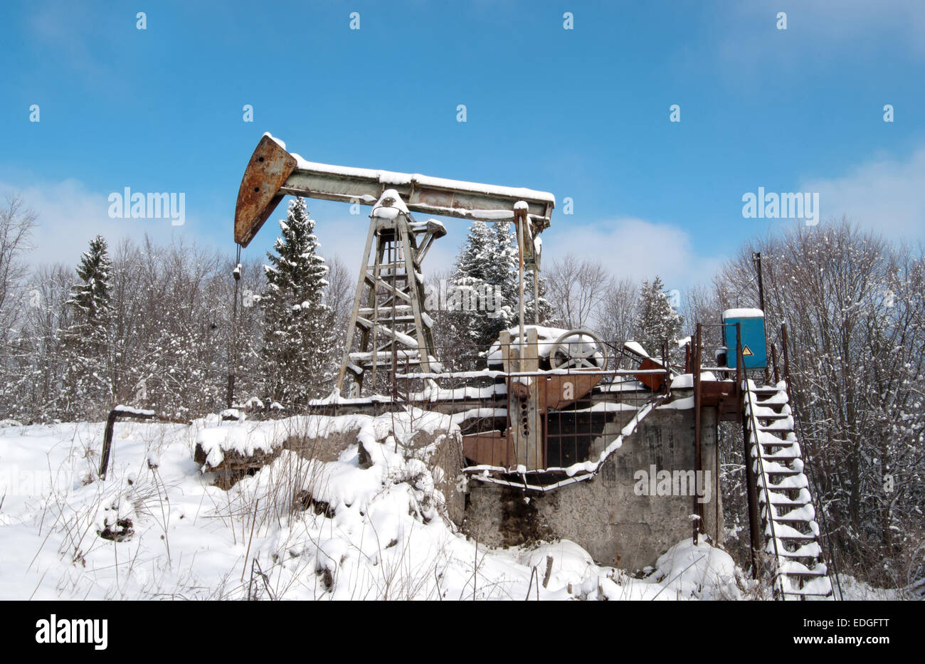 oil wells are drilling oil at winter Stock Photo - Alamy