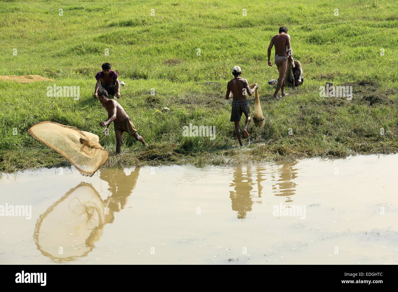 Man Throwing Cast Net On High Resolution Stock Photography and Images ...