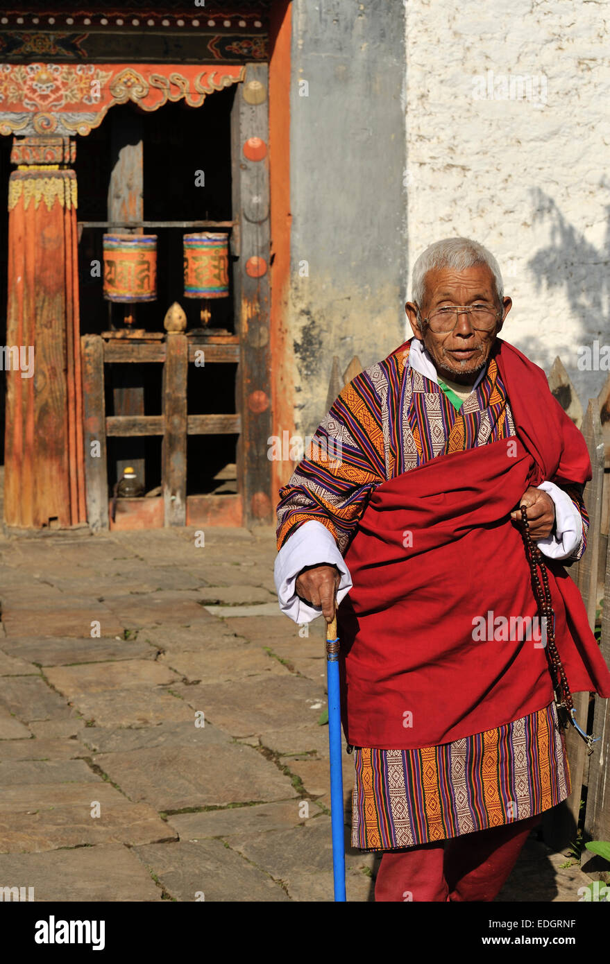 Man wearing traditional clothes in Jampey Lhakhang temple, Jakar ...