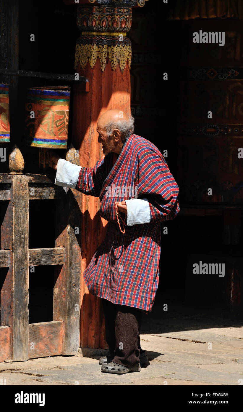 Man wearing traditional clothes in Jampey Lhakhang temple, Jakar ...