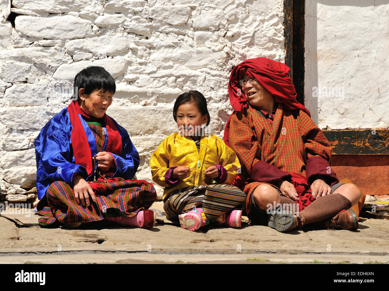 People in traditional bhutanese clothes hi-res stock photography and ...