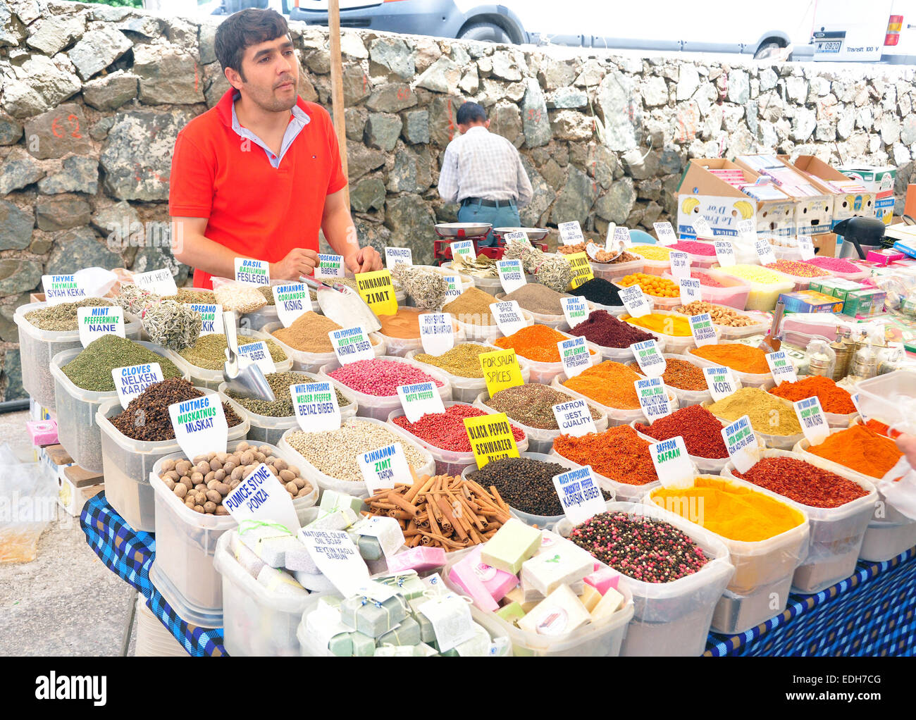 Market stall at Içmeler's weekly market selling colourful herbs and ...