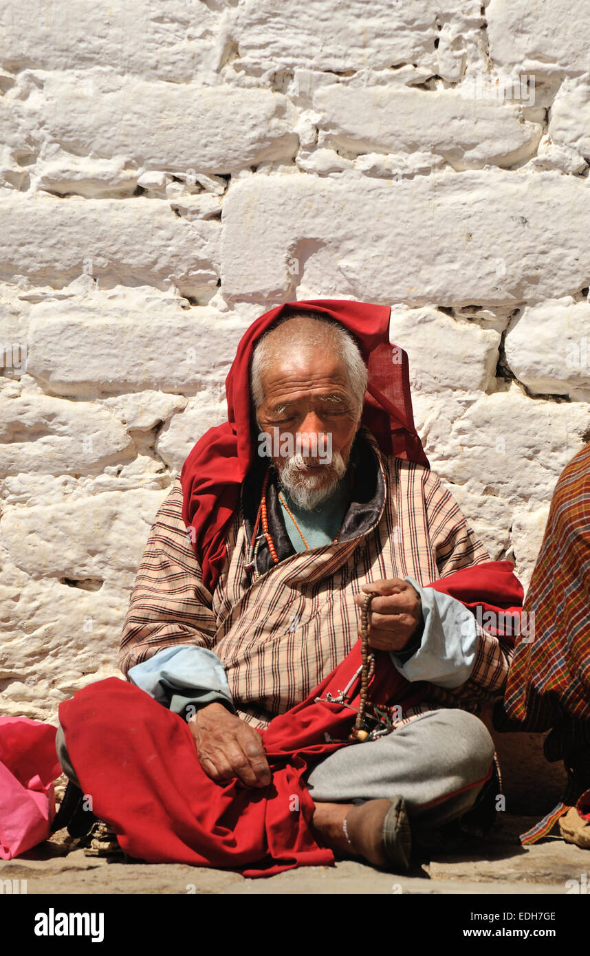 Man wearing traditional clothes in Jampey Lhakhang temple, Jakar ...
