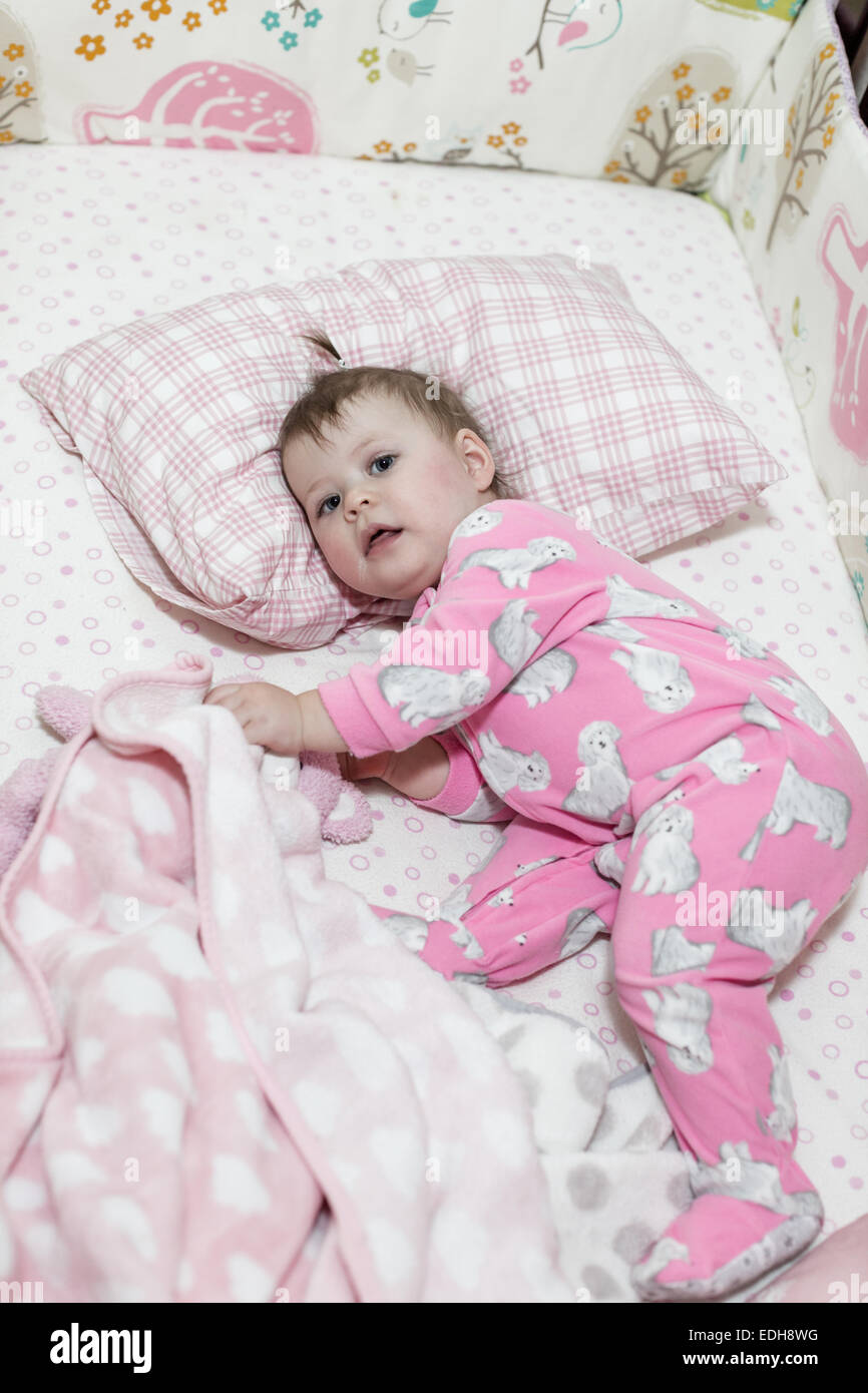 Cute toddler girl waking up from her nap Stock Photo - Alamy