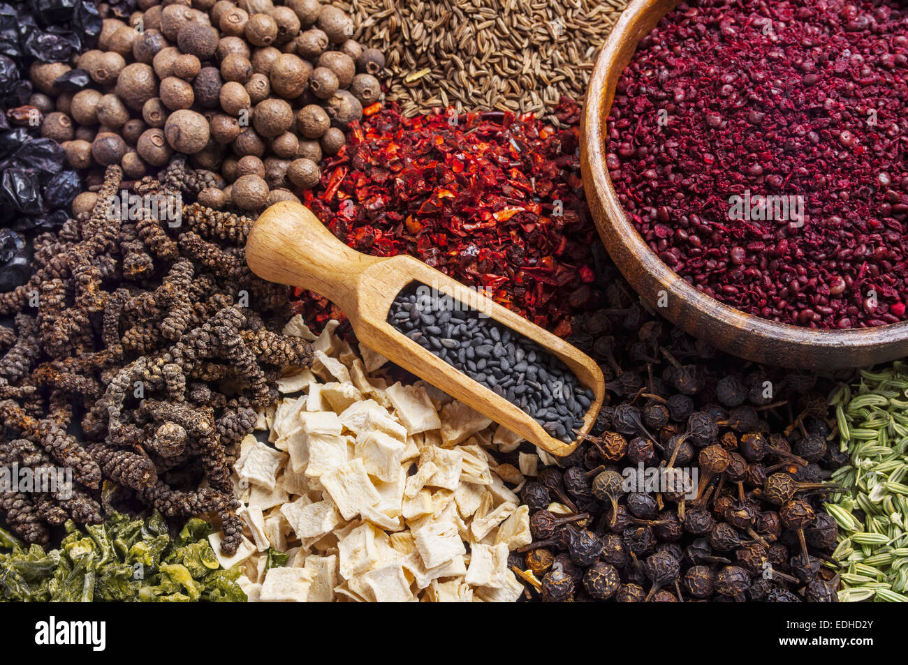 Colorful spices and herbs background Stock Photo - Alamy