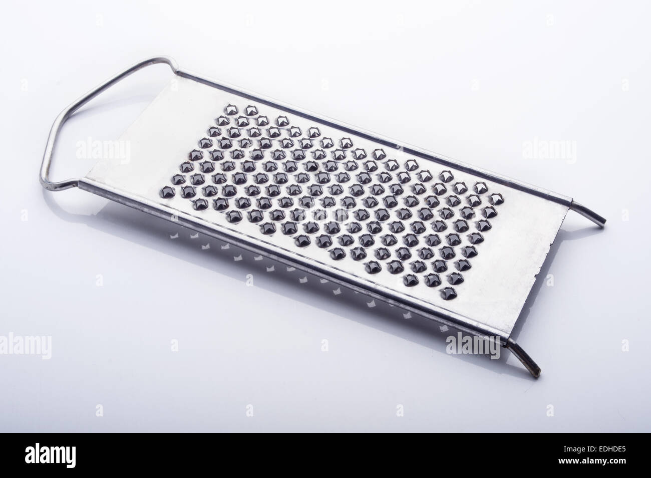 Metal grater isolated on white background Stock Photo - Alamy