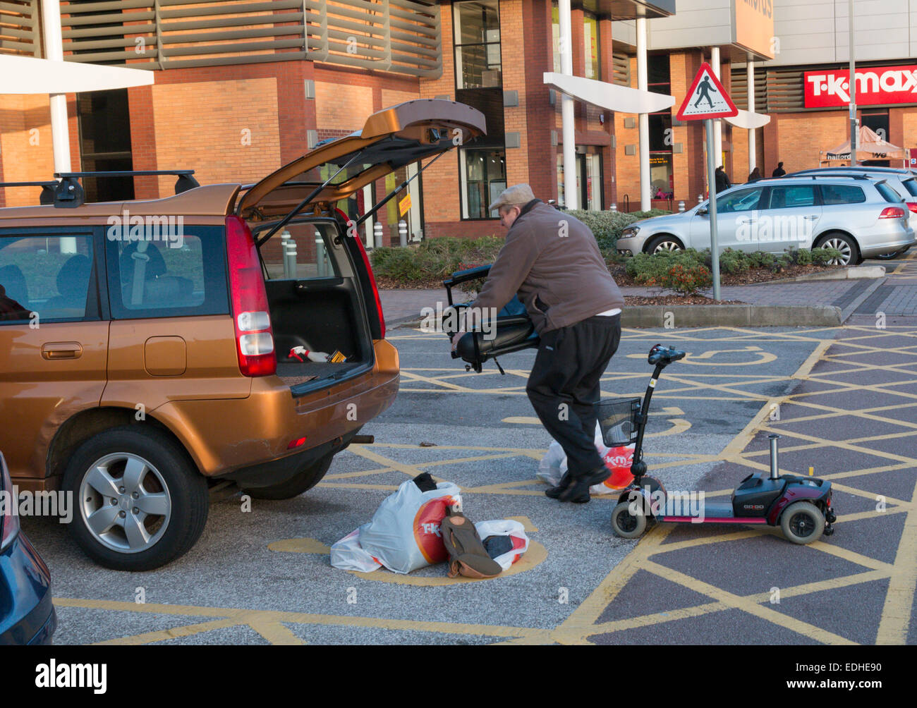 Shopping in mobility scooter hi-res stock photography and images - Alamy