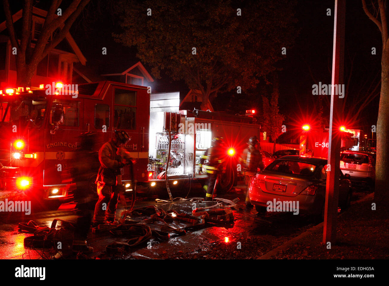 Firemen packing truck hi-res stock photography and images - Alamy