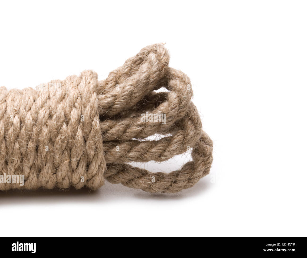 coil of hemp rope isolated on a white background Stock Photo - Alamy