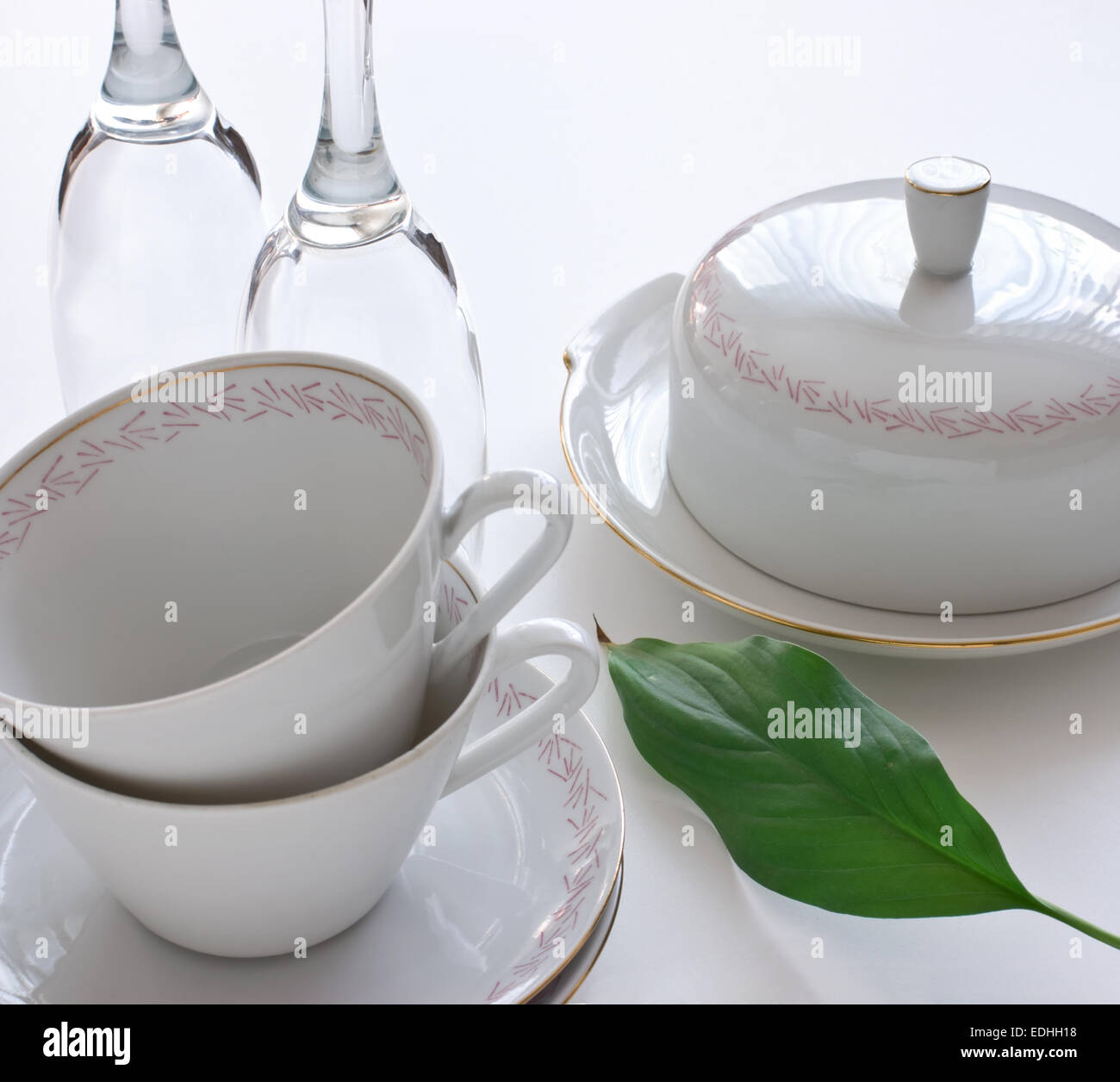 stack of cups and glasses on the table Stock Photo - Alamy