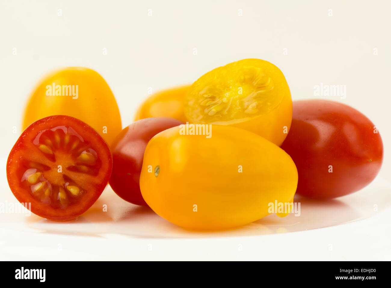 Small red and yellow tomato Stock Photo - Alamy