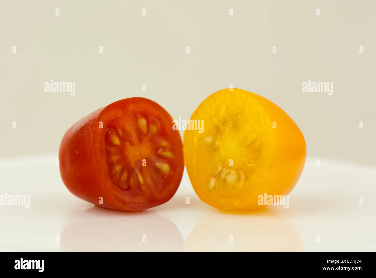Small red and yellow tomato Stock Photo - Alamy
