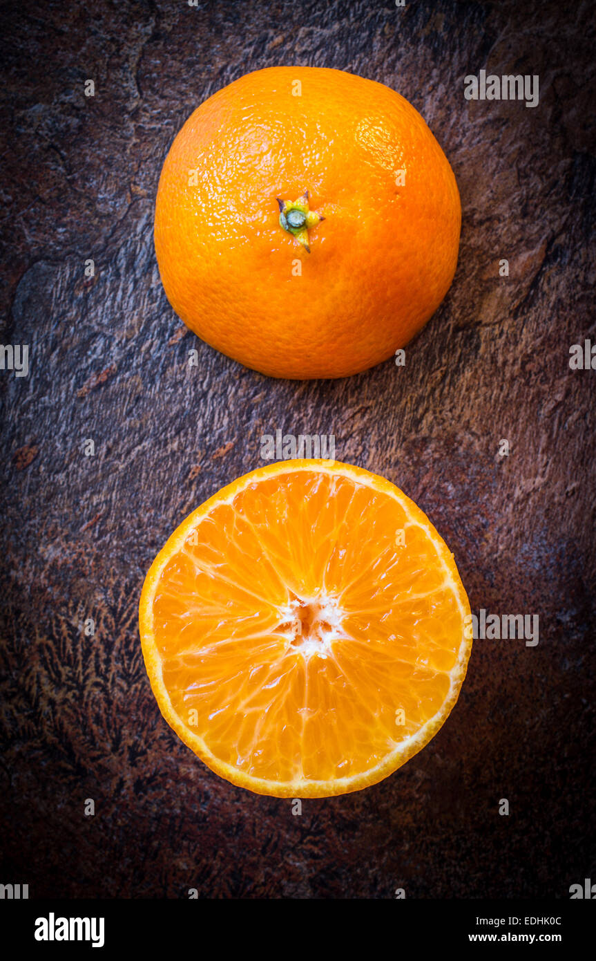 Orange, mandarin, tangerine half top view Stock Photo - Alamy