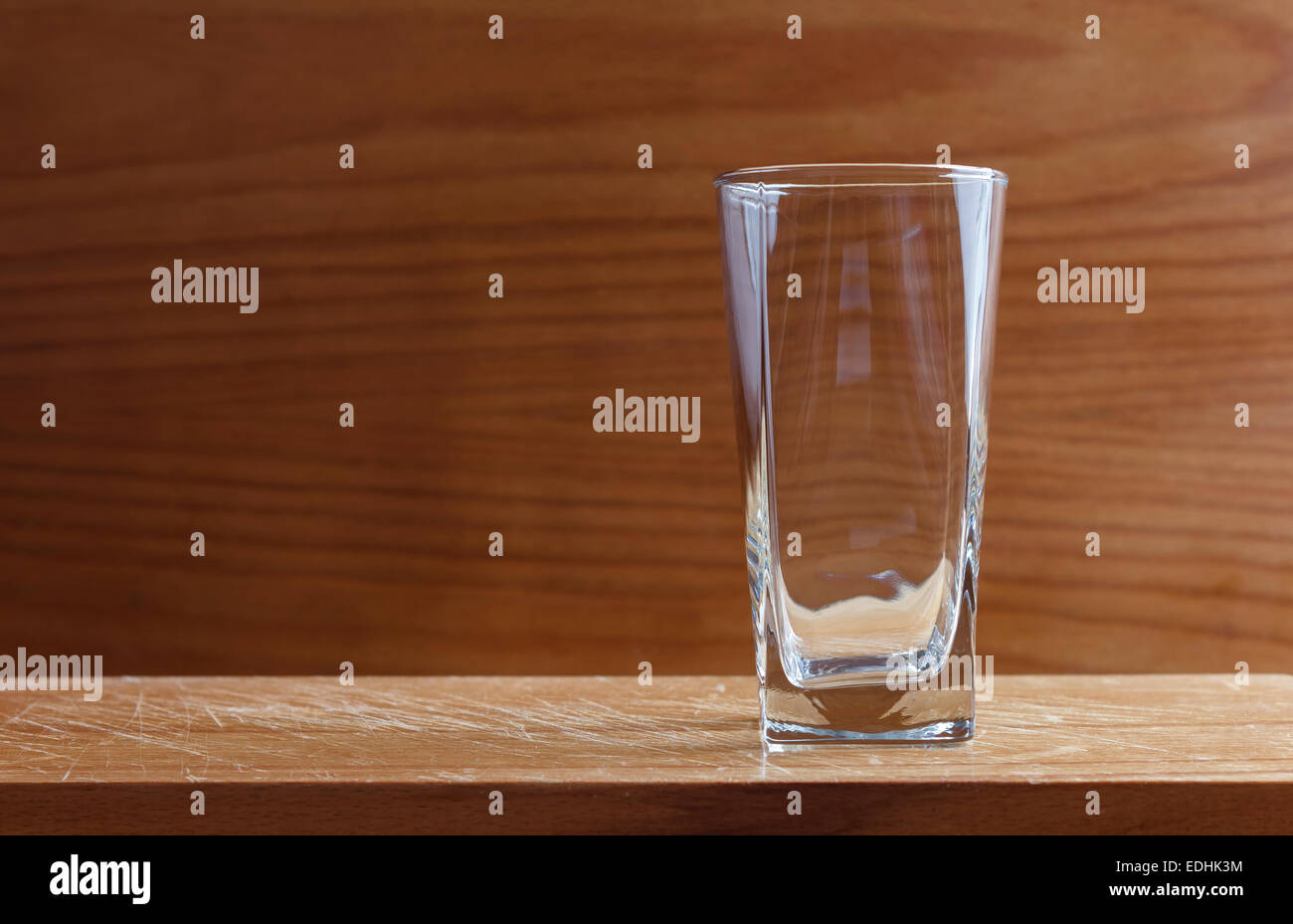 Glass on the wood Stock Photo - Alamy