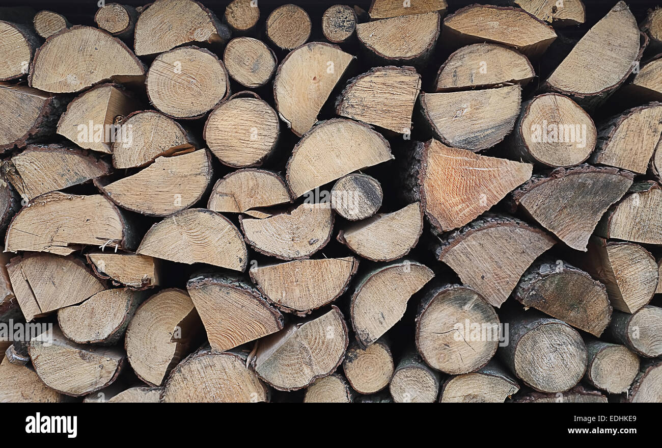 Background of stumps for fireplace Stock Photo - Alamy
