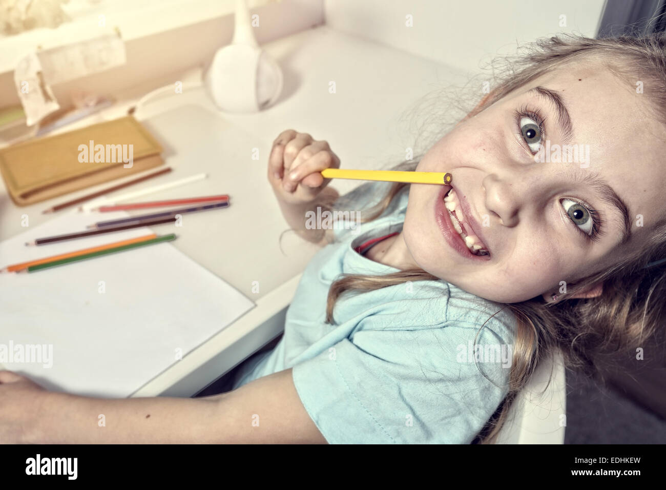 happy young girl doing homework Stock Photo - Alamy