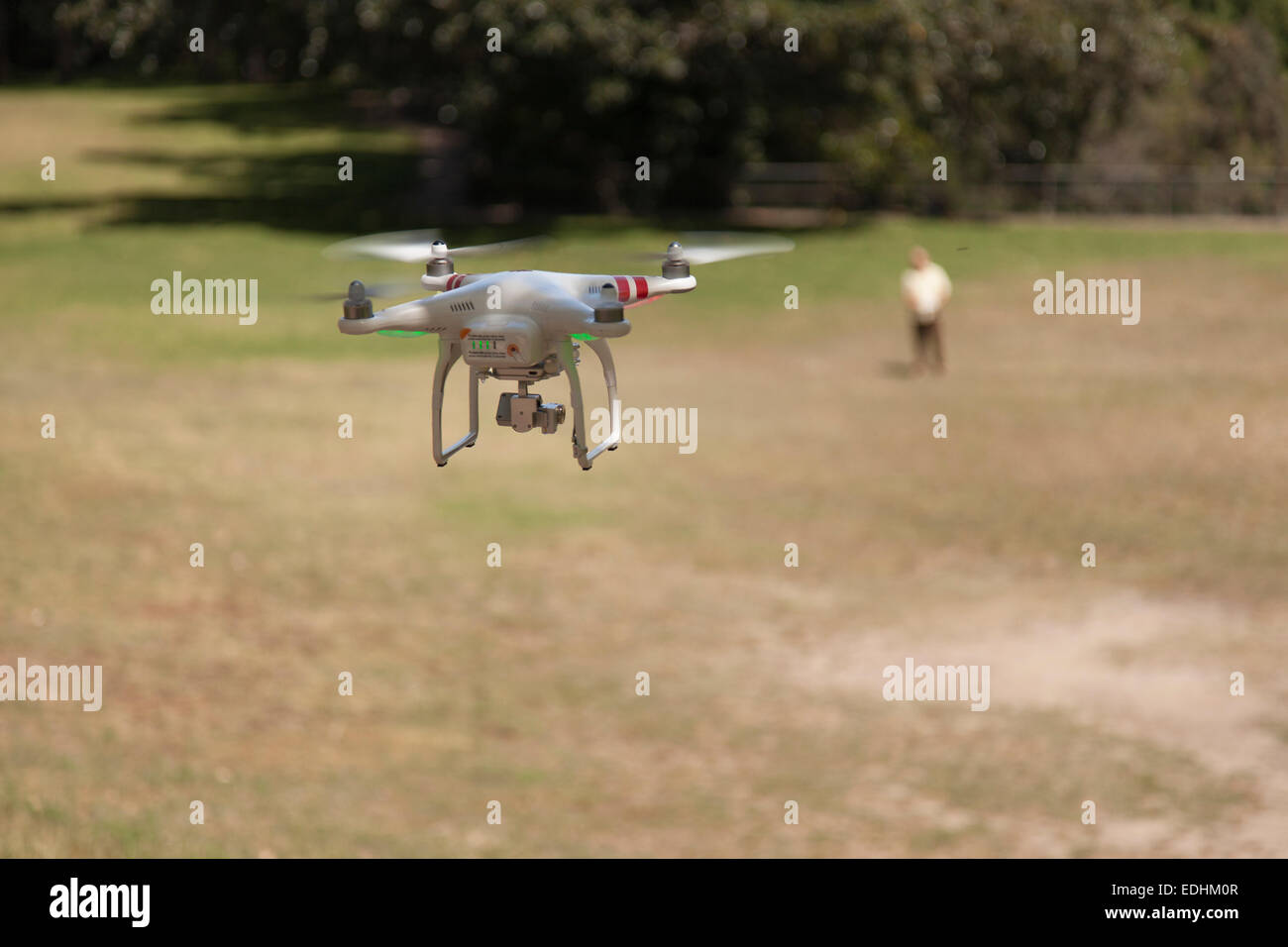 Drone Operator flying his drone Stock Photo - Alamy