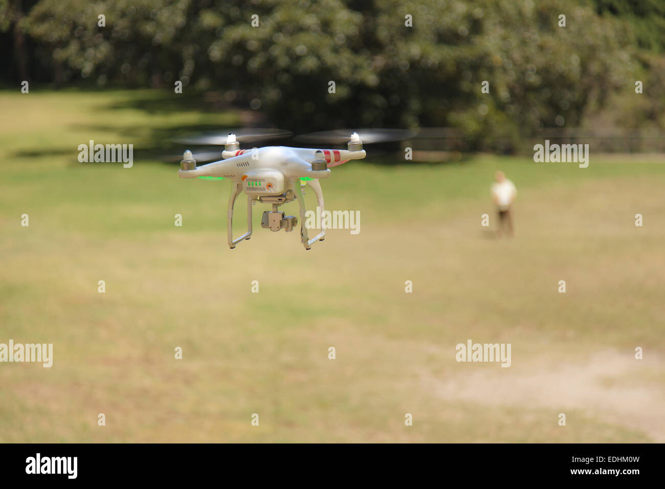 Drone Operator flying his drone Stock Photo - Alamy