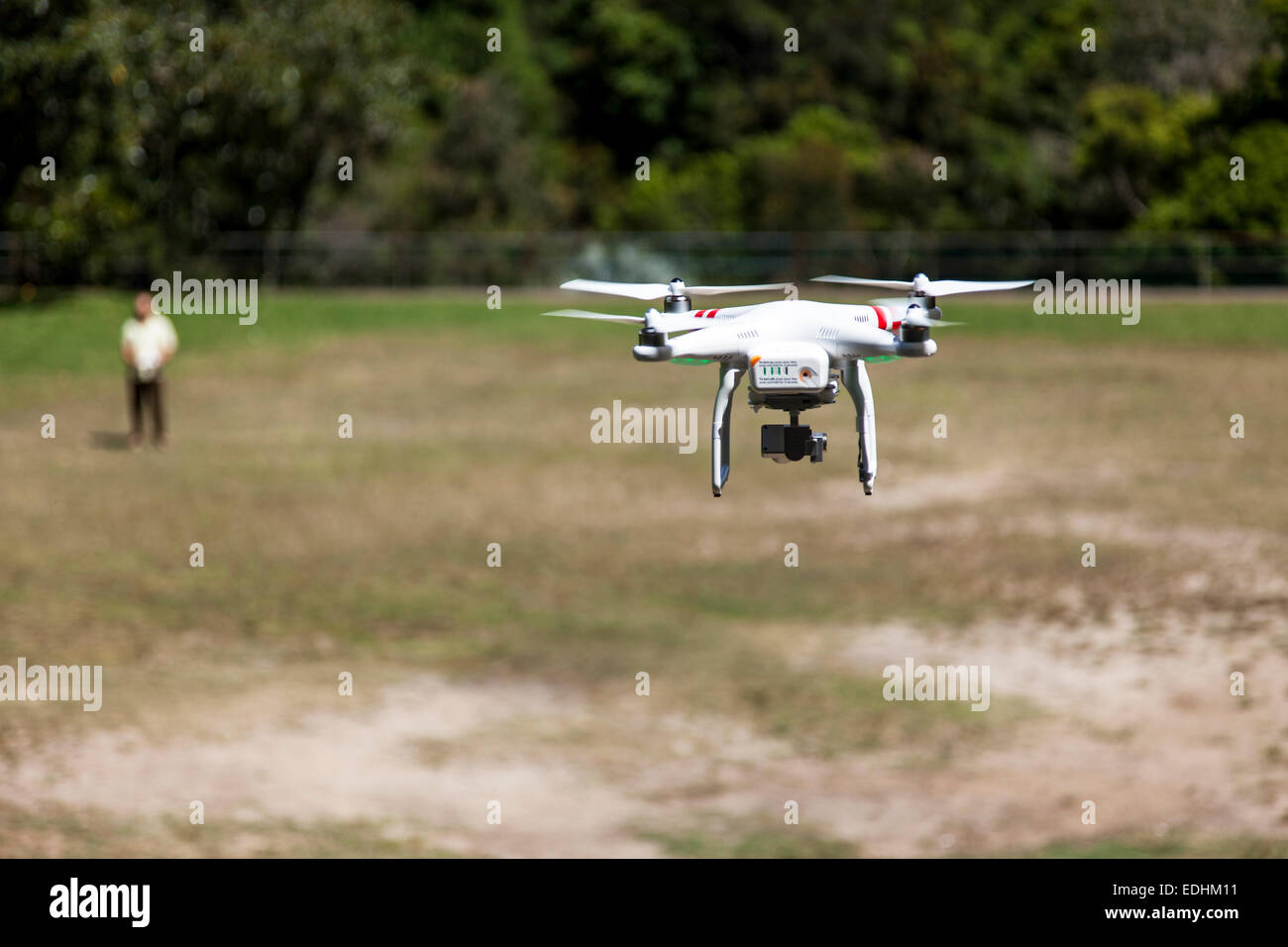 Drone Operator flying his drone Stock Photo - Alamy