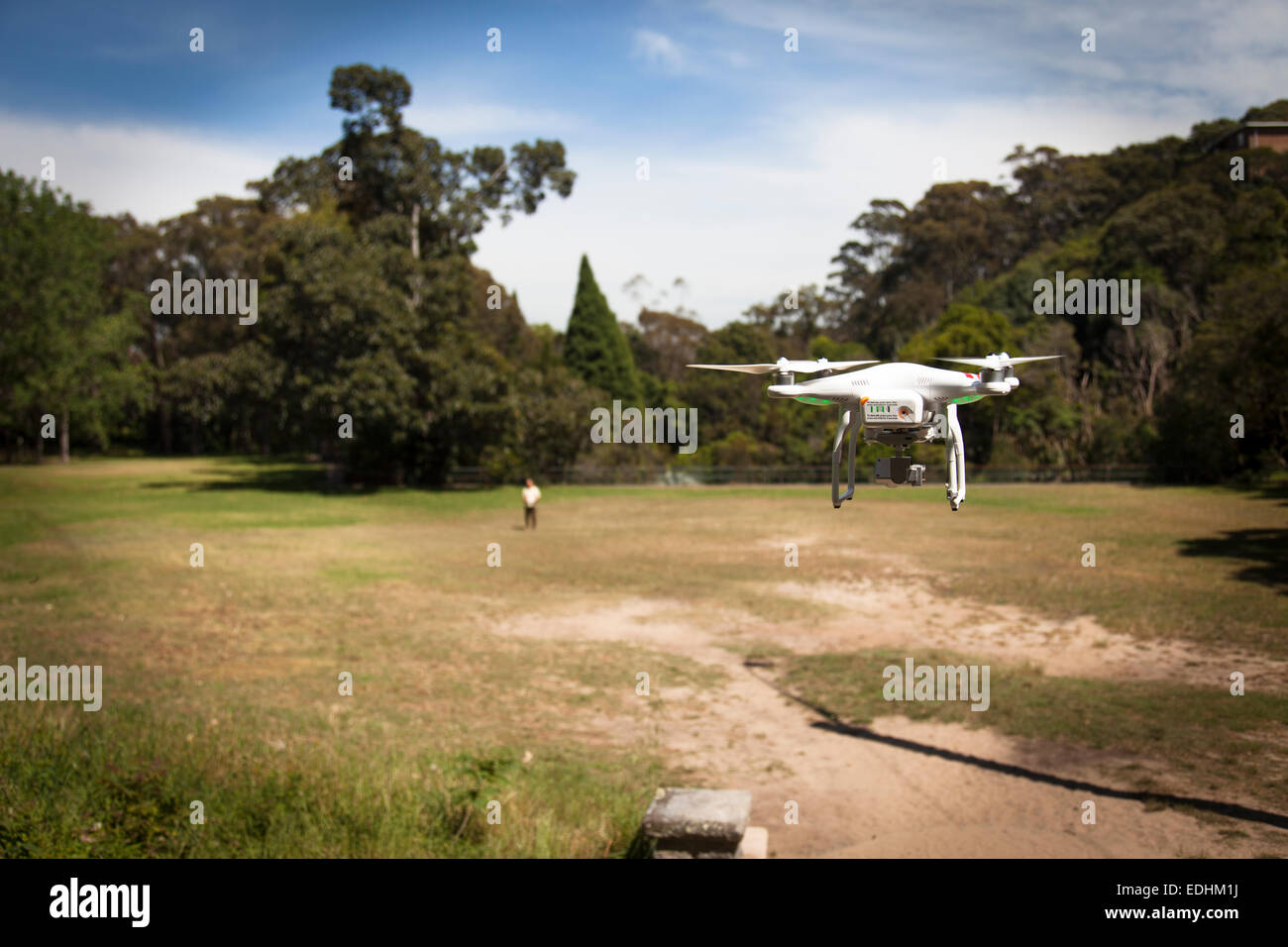Drone Operator flying his drone Stock Photo - Alamy