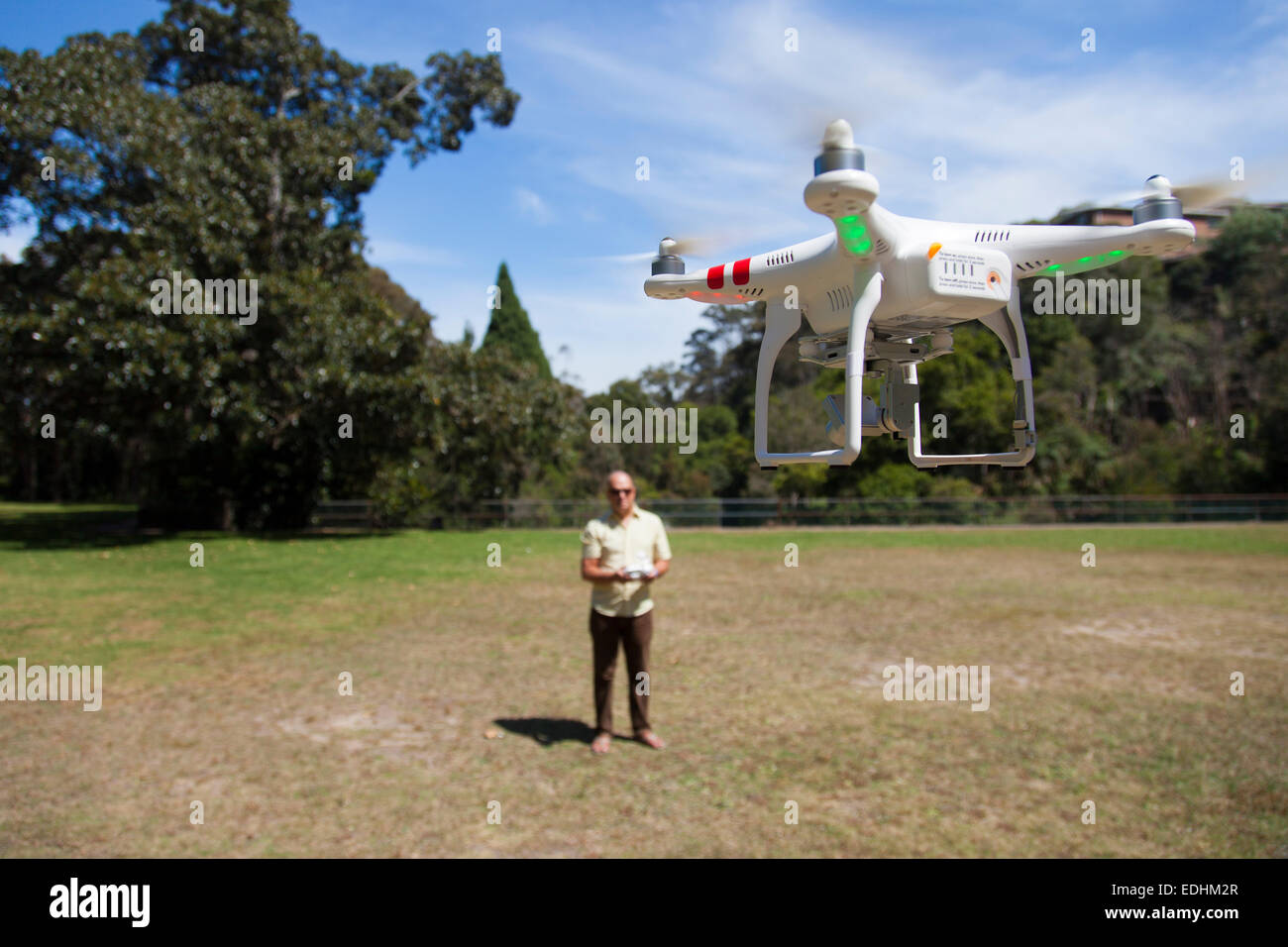 Drone Operator flying his drone Stock Photo - Alamy