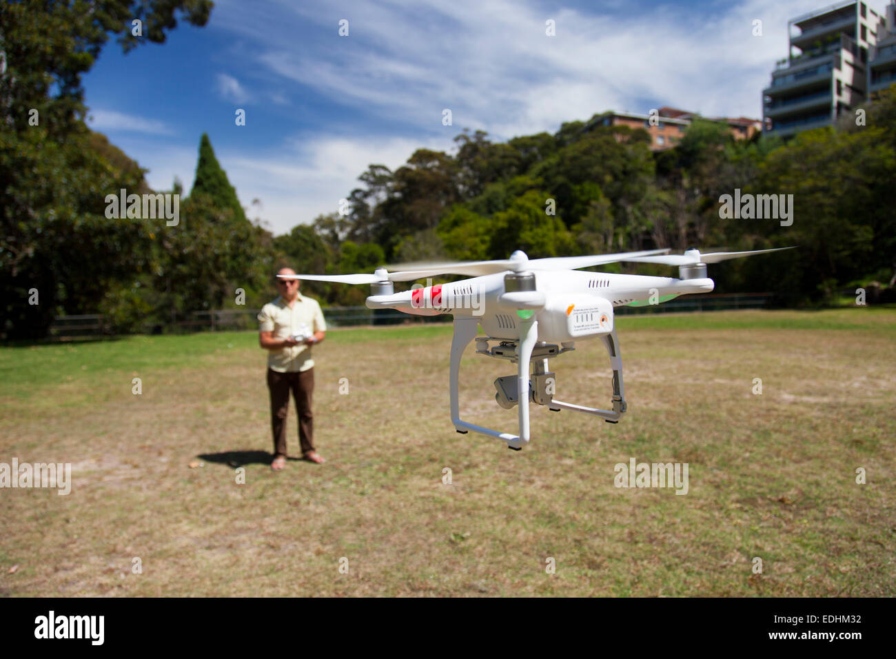 Drone Operator flying his drone Stock Photo - Alamy