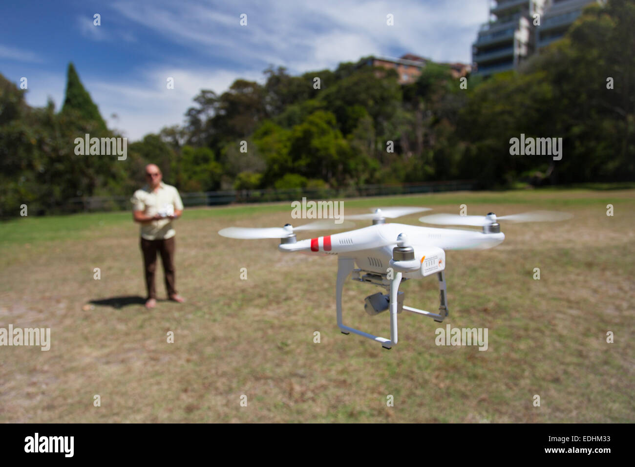 Drone Operator flying his drone Stock Photo - Alamy