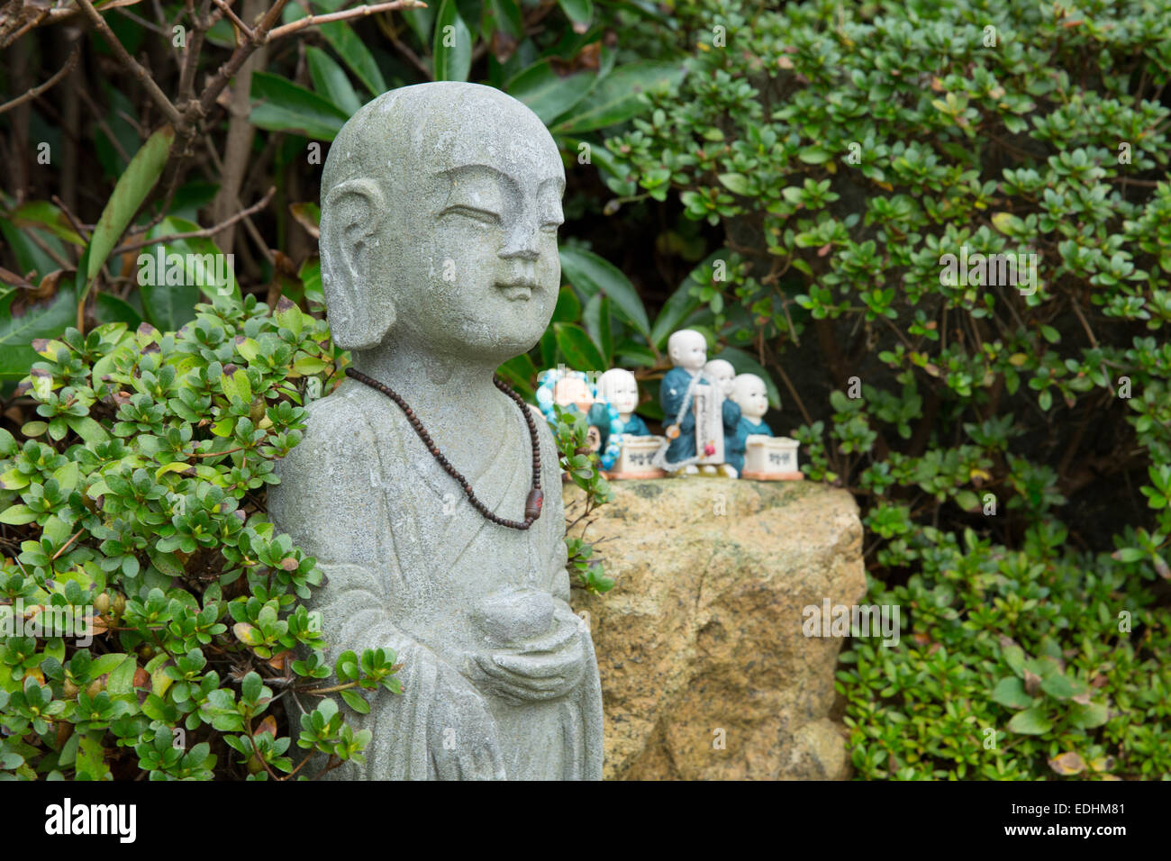Stone statue of monk at a temple in South Korea Stock Photo - Alamy