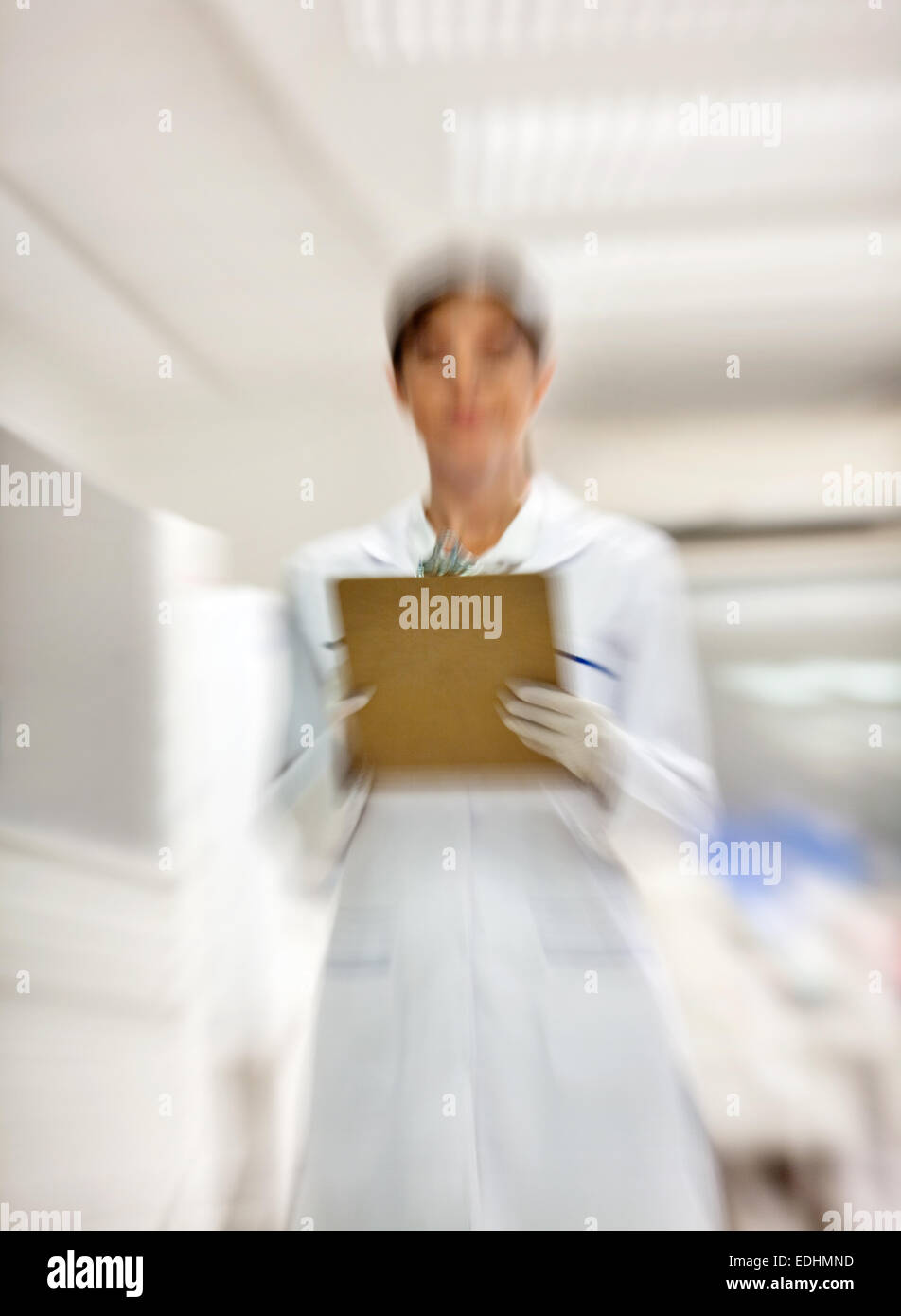 Female Researcher Walking In Hospital Stock Photo - Alamy