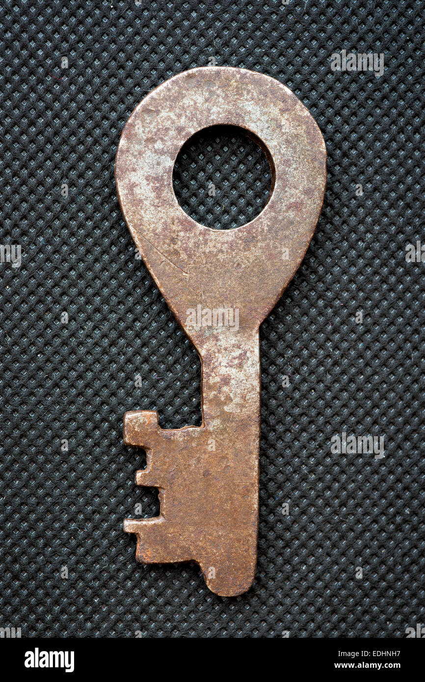 vintage rusty key on black soft background Stock Photo - Alamy