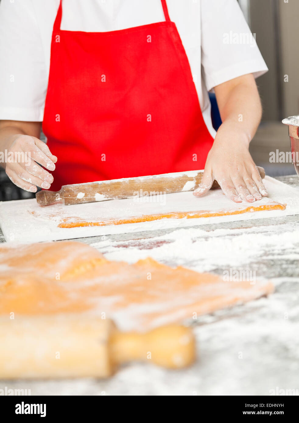 Happy Chef Rolling Pasta Sheet At Counter Stock Photo - Alamy