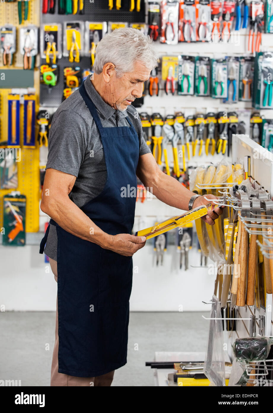 Salesperson Working In Hardware Store Stock Photo - Alamy
