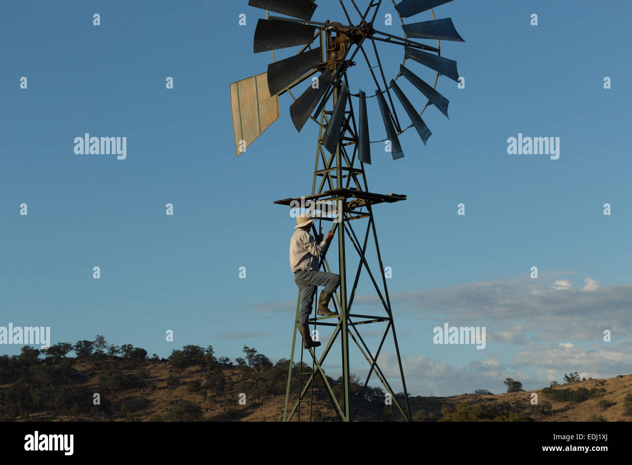 Australia outback man water pump hi-res stock photography and images ...