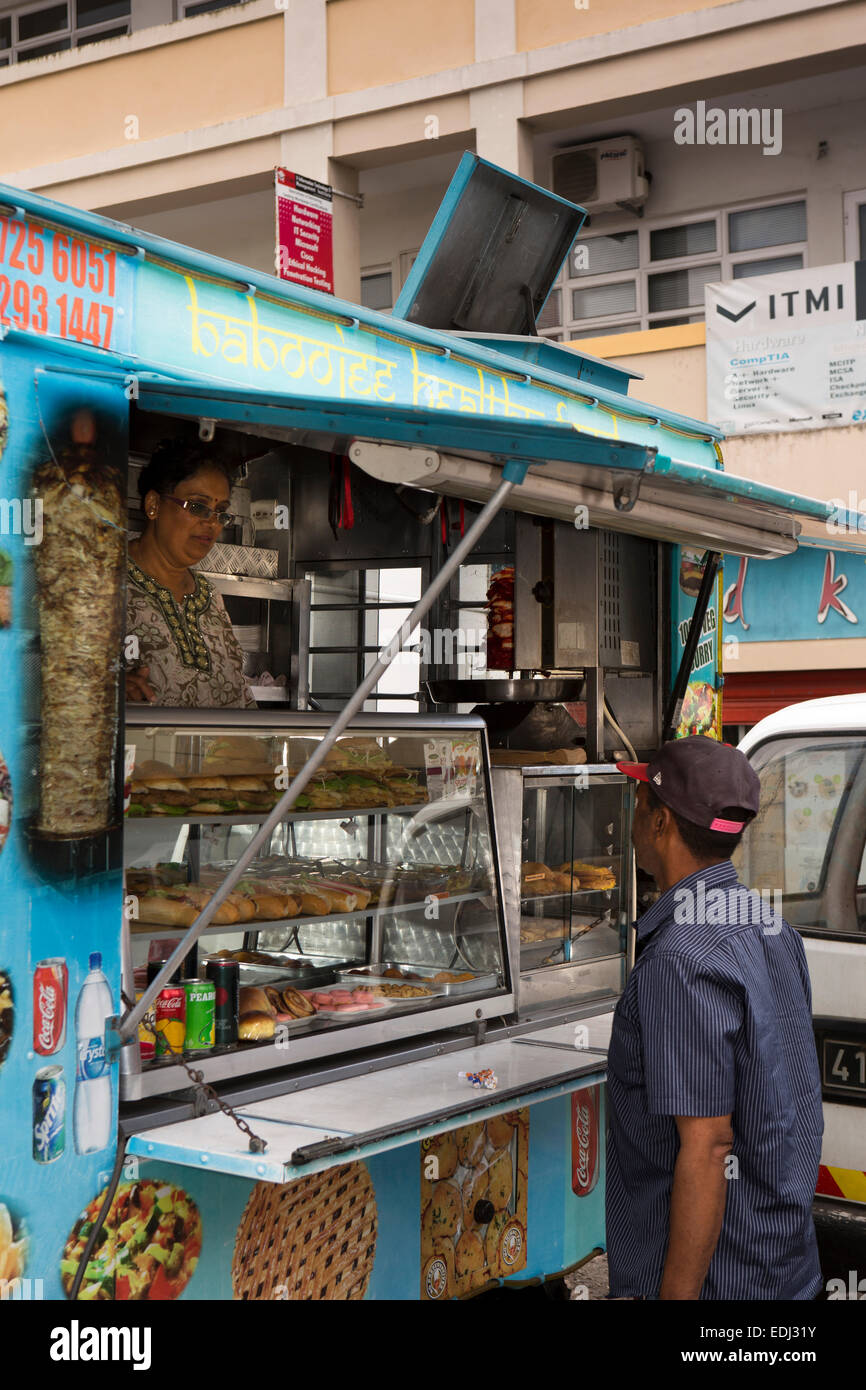 Mauritius, Quatre Bornes, man at Baboojee Health Food mobile snack ...