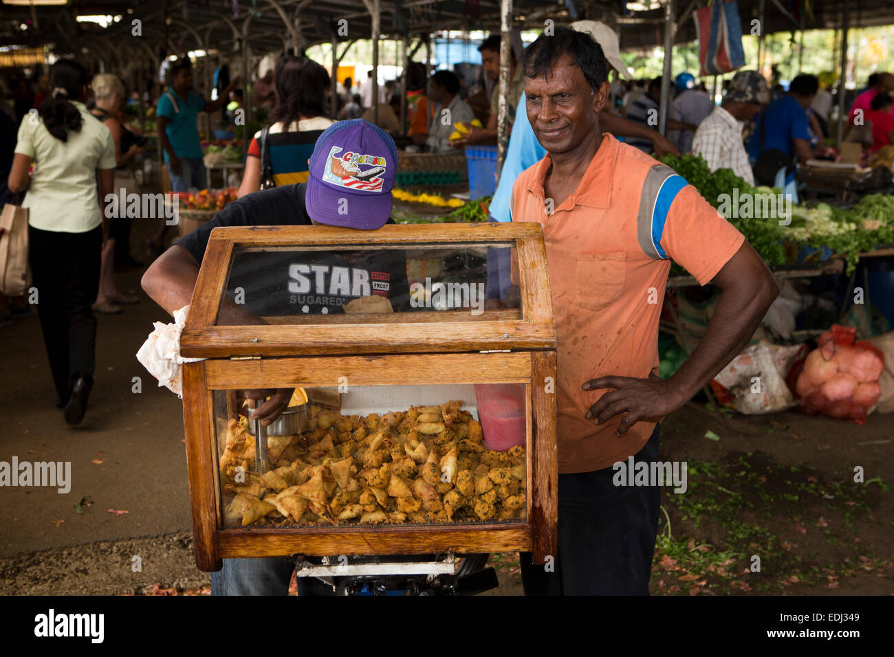 Mauritius, Quatre Bornes, snack seller selling samosas and pakoras from ...
