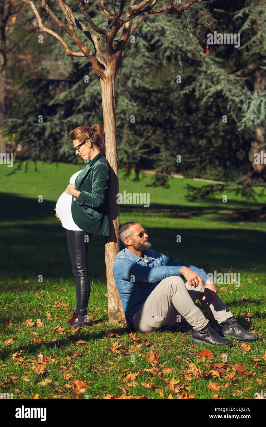 Couple who is expecting a child relaxes Stock Photo - Alamy