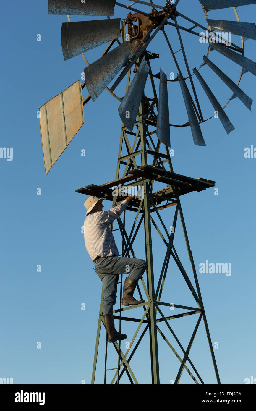 Australia outback man water pump hi-res stock photography and images ...