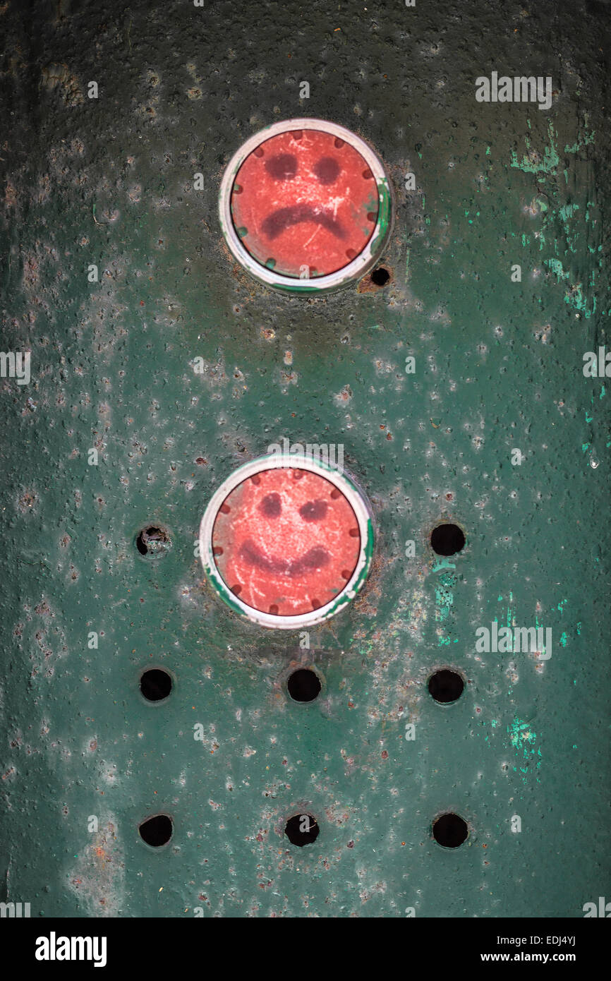 Two buttons of choice: be sad or happy Stock Photo - Alamy