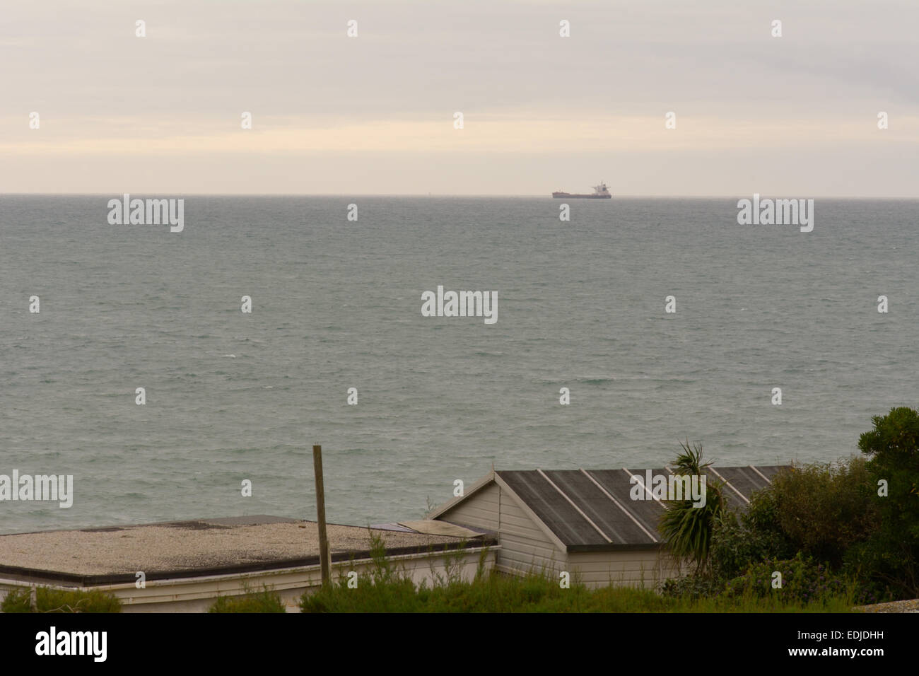 Large ship in sea passing Gunwalloe beach in Gunwalloe, Cornwall ...