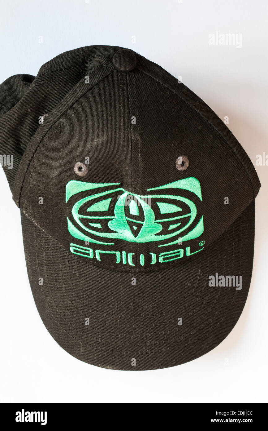 Animal black baseball cap with green writing and logo isolated on white ...