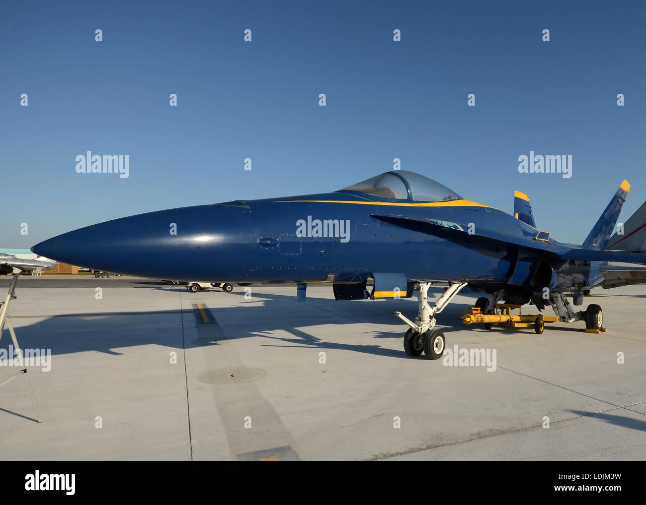 Modern navy fighter jet in blue color on the ground Stock Photo - Alamy