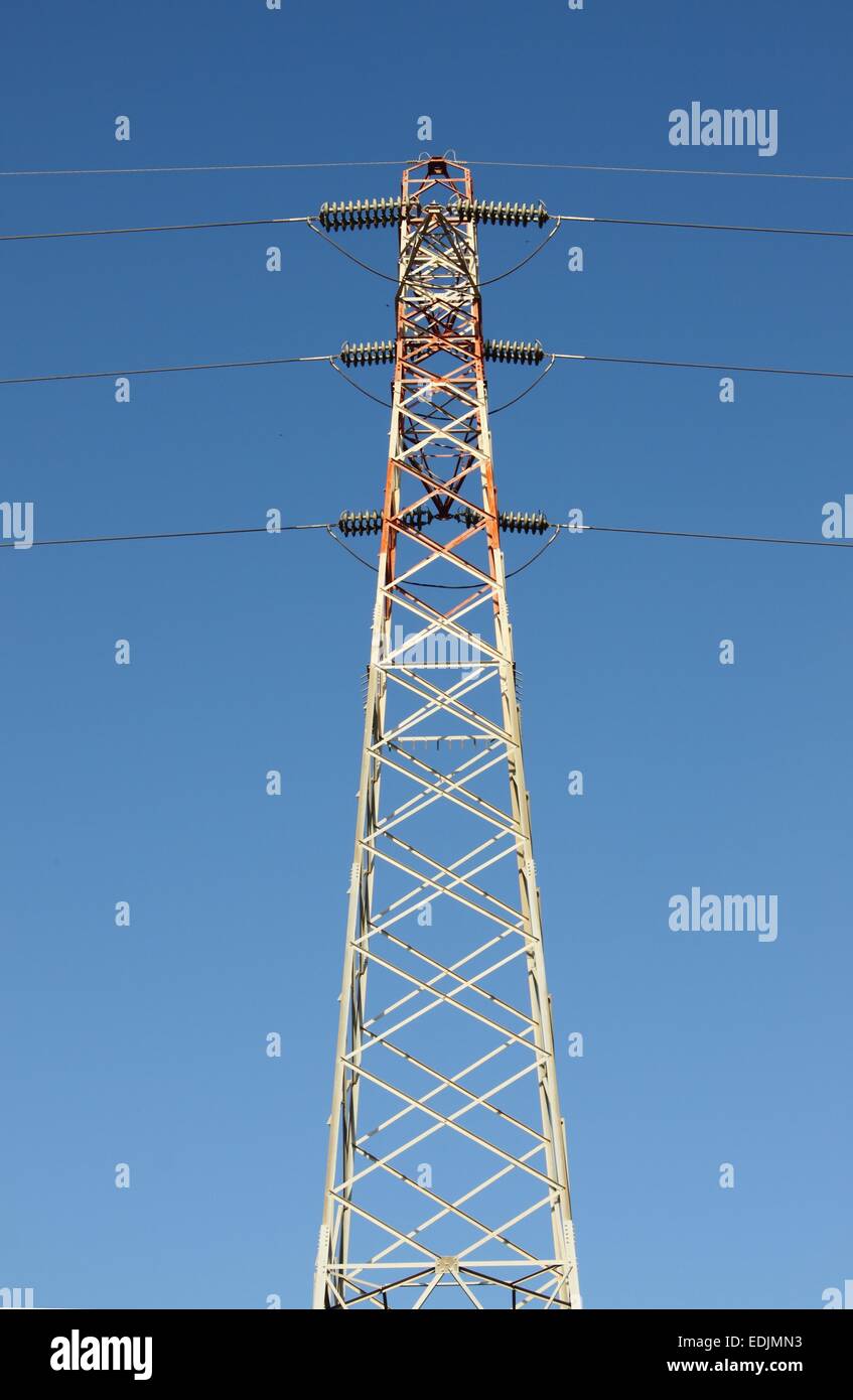 Power line tower on a blue sky background Stock Photo - Alamy