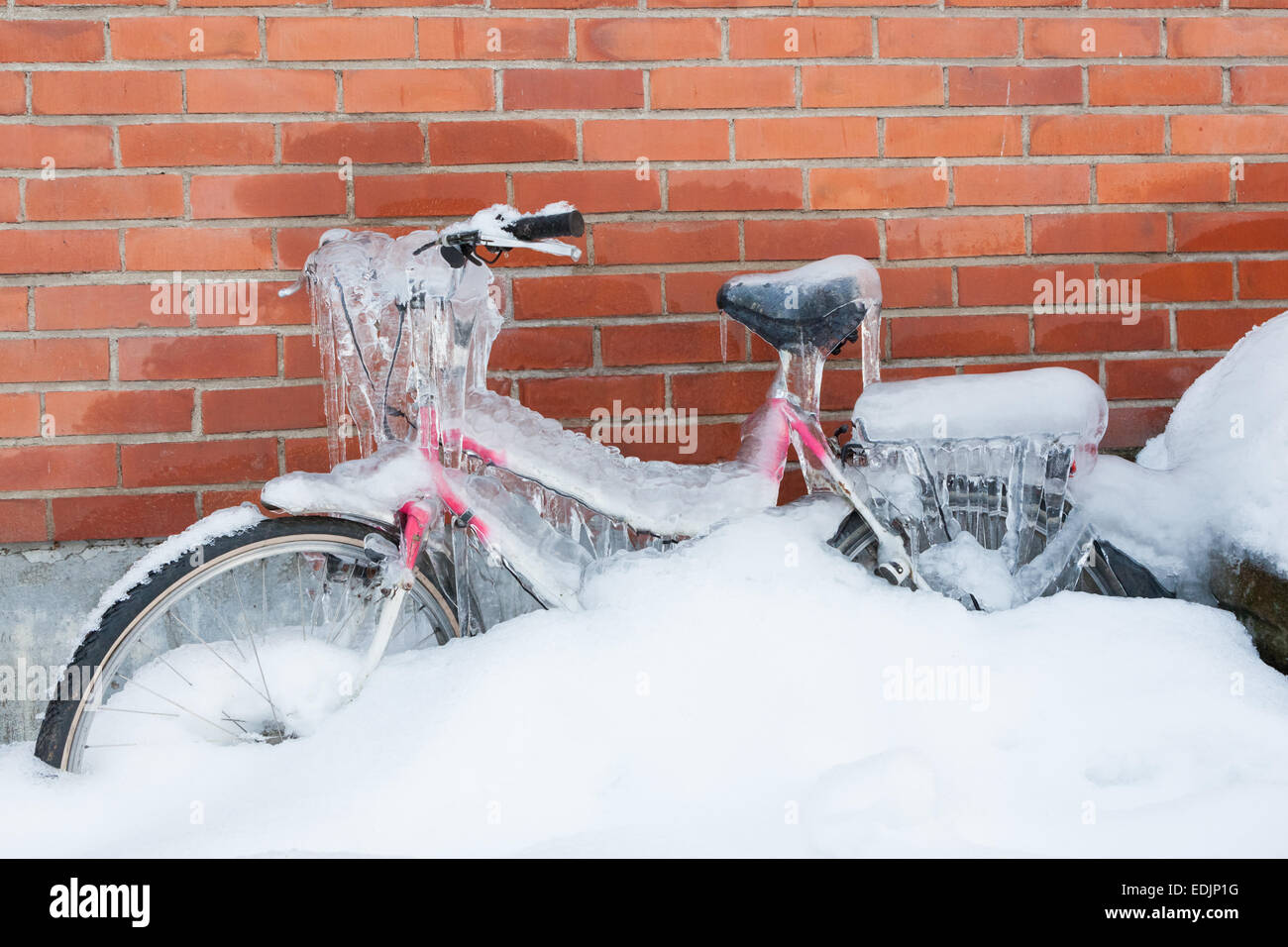 Frozen bike covered in ice Stock Photo - Alamy