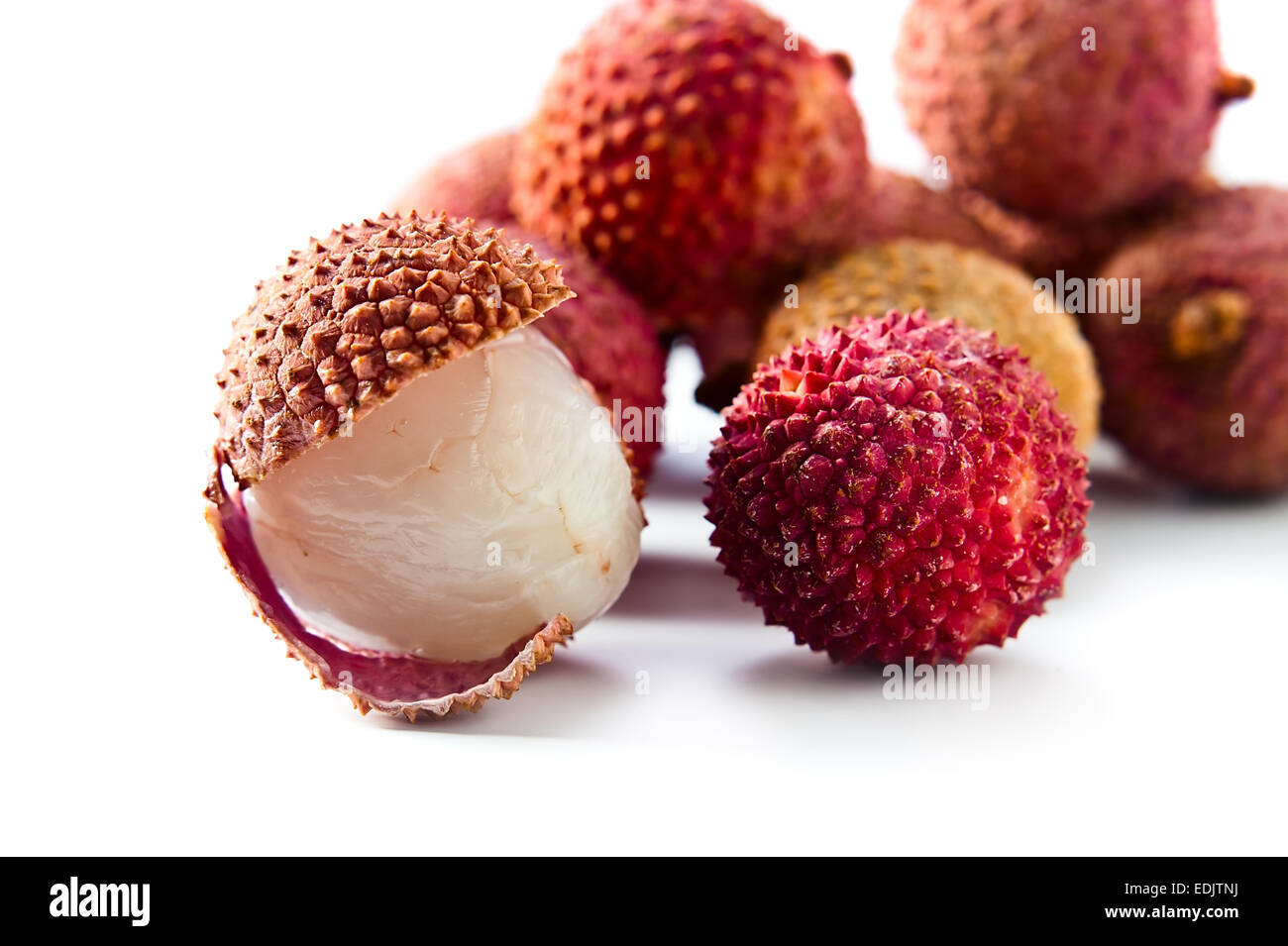 fresh ripe lychees on white background Stock Photo - Alamy