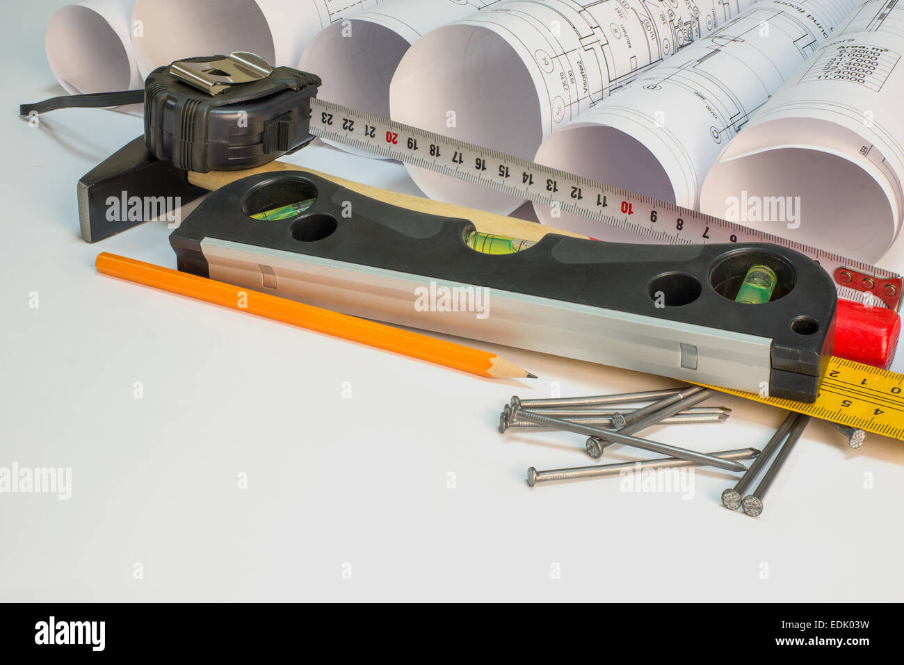 Drawing rolls and construction tools composition Stock Photo - Alamy