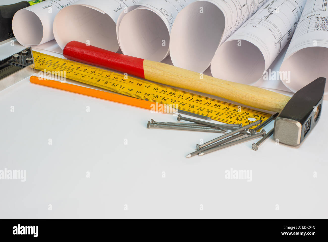 Drawing rolls and construction tools composition Stock Photo - Alamy
