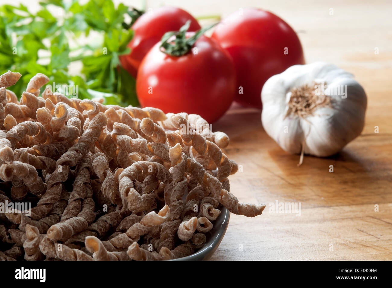 corkscrew shaped raw pasta called busiate with whole wheat flour of ...