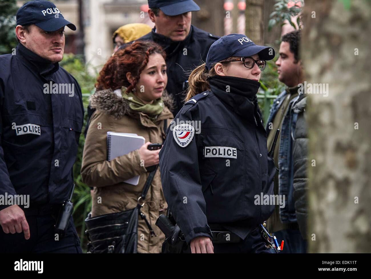 Paris, France. 7th Jan, 2015. French police officers stand guard near ...