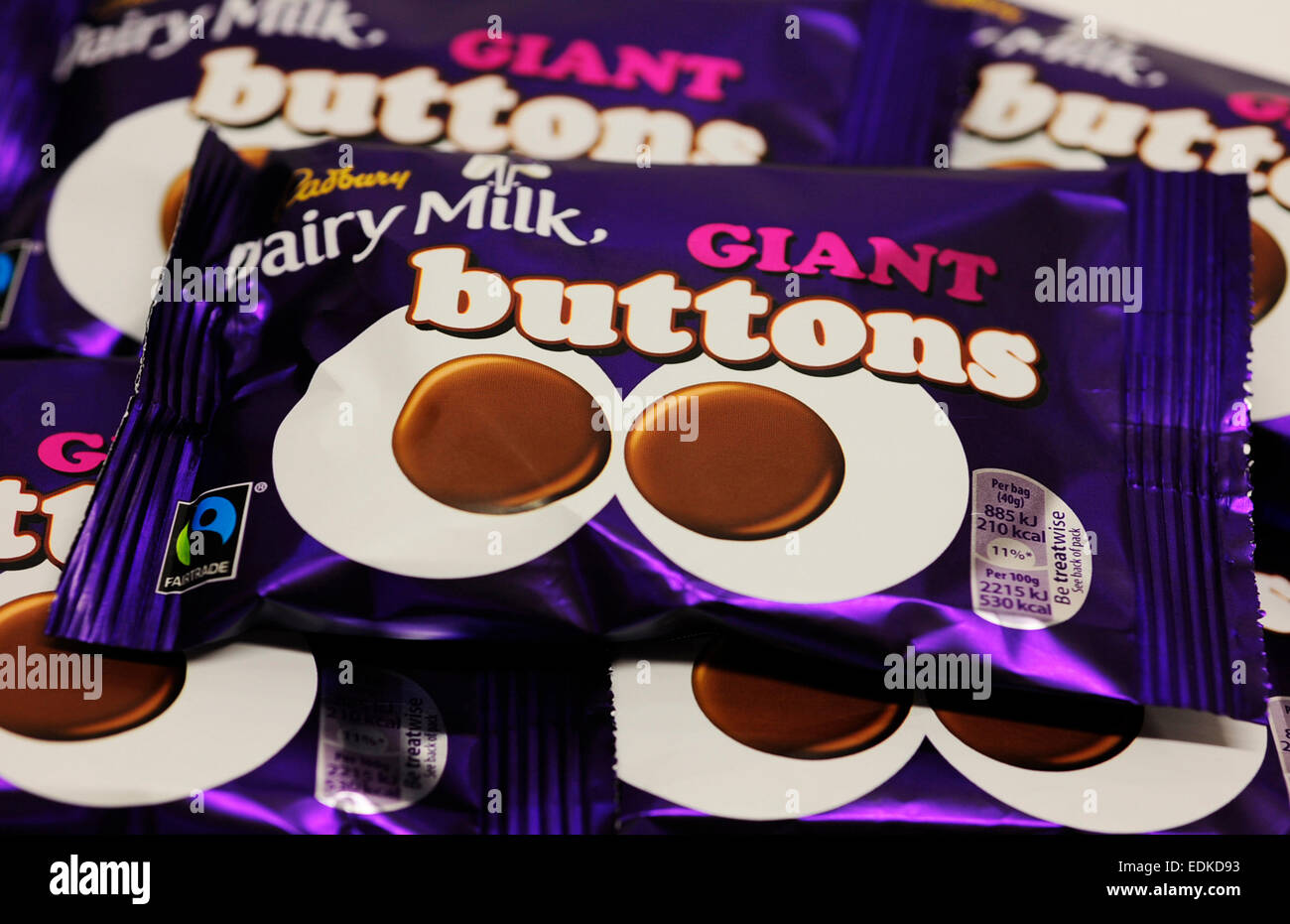 Cadburys milk chocolate buttons hi-res stock photography and images - Alamy