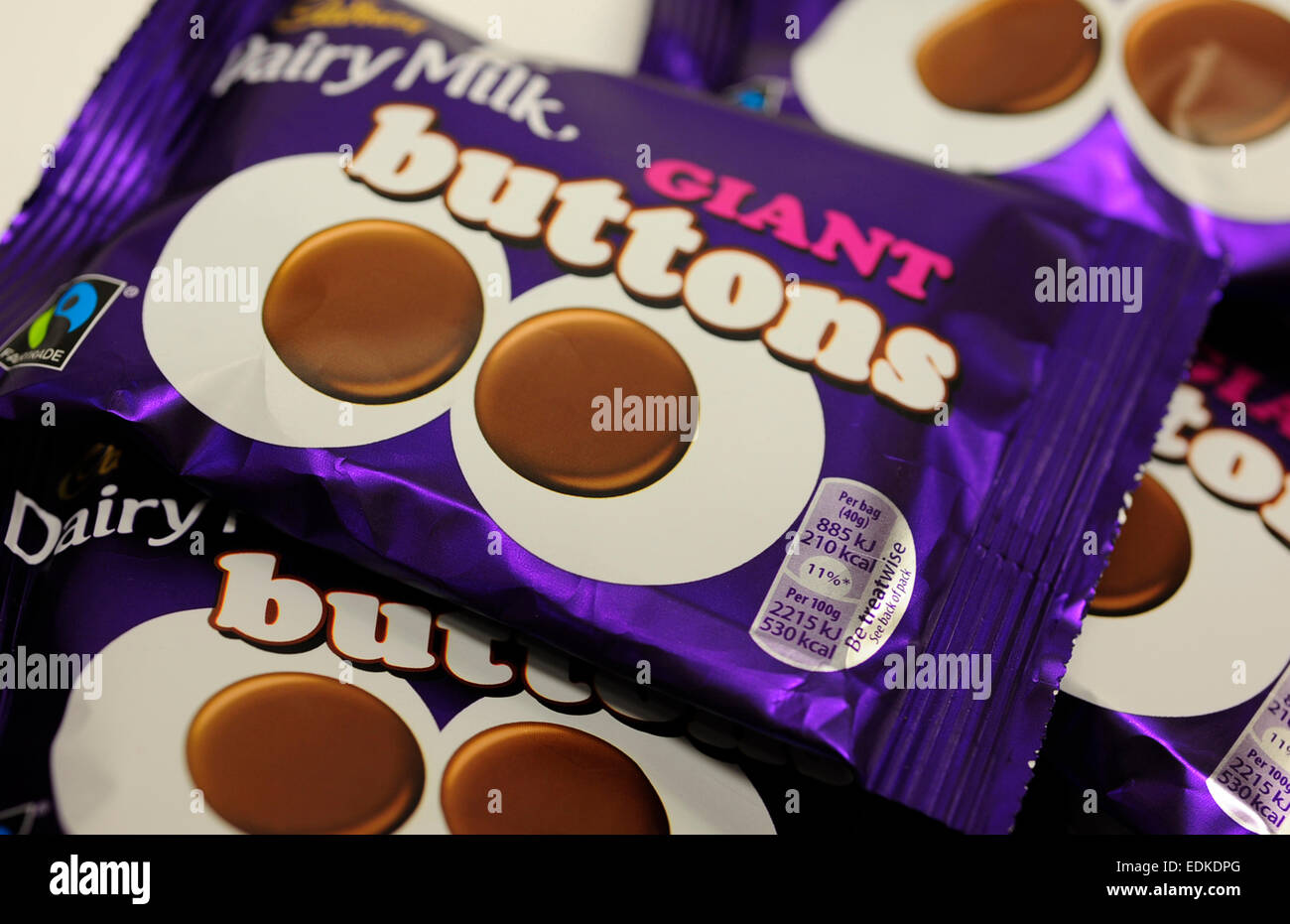 Cadburys milk chocolate buttons hi-res stock photography and images - Alamy